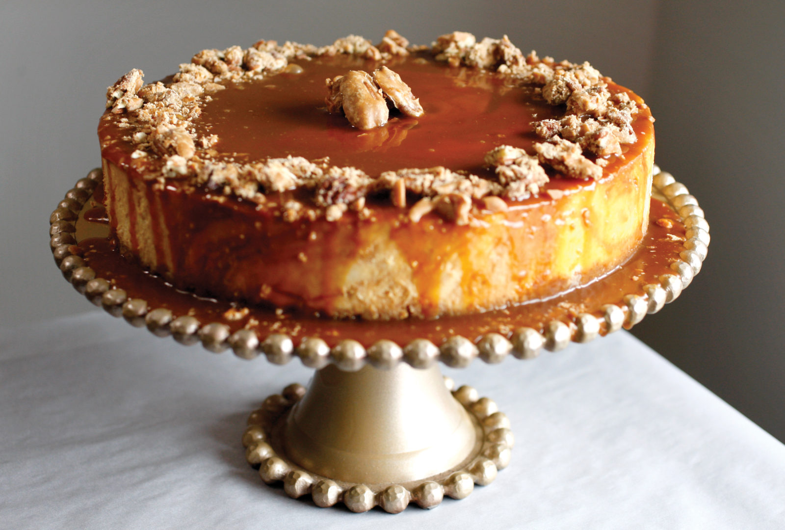 Bourbon Salted Caramel Cheesecake with Pralines – Garden & Gun
